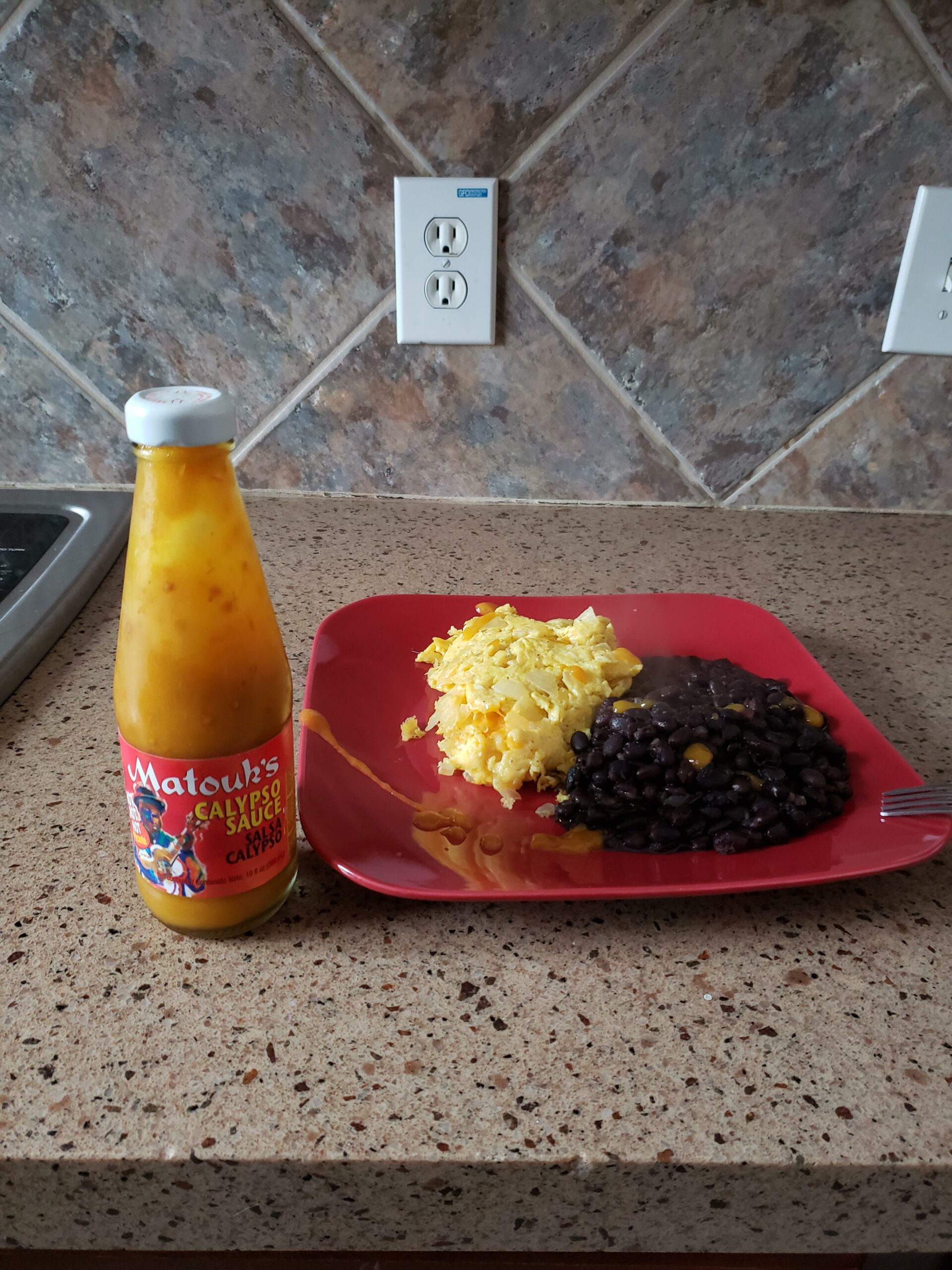 Lumberjack breakfast of eggs, beans and spicy Calypso sauce. This stuff ...