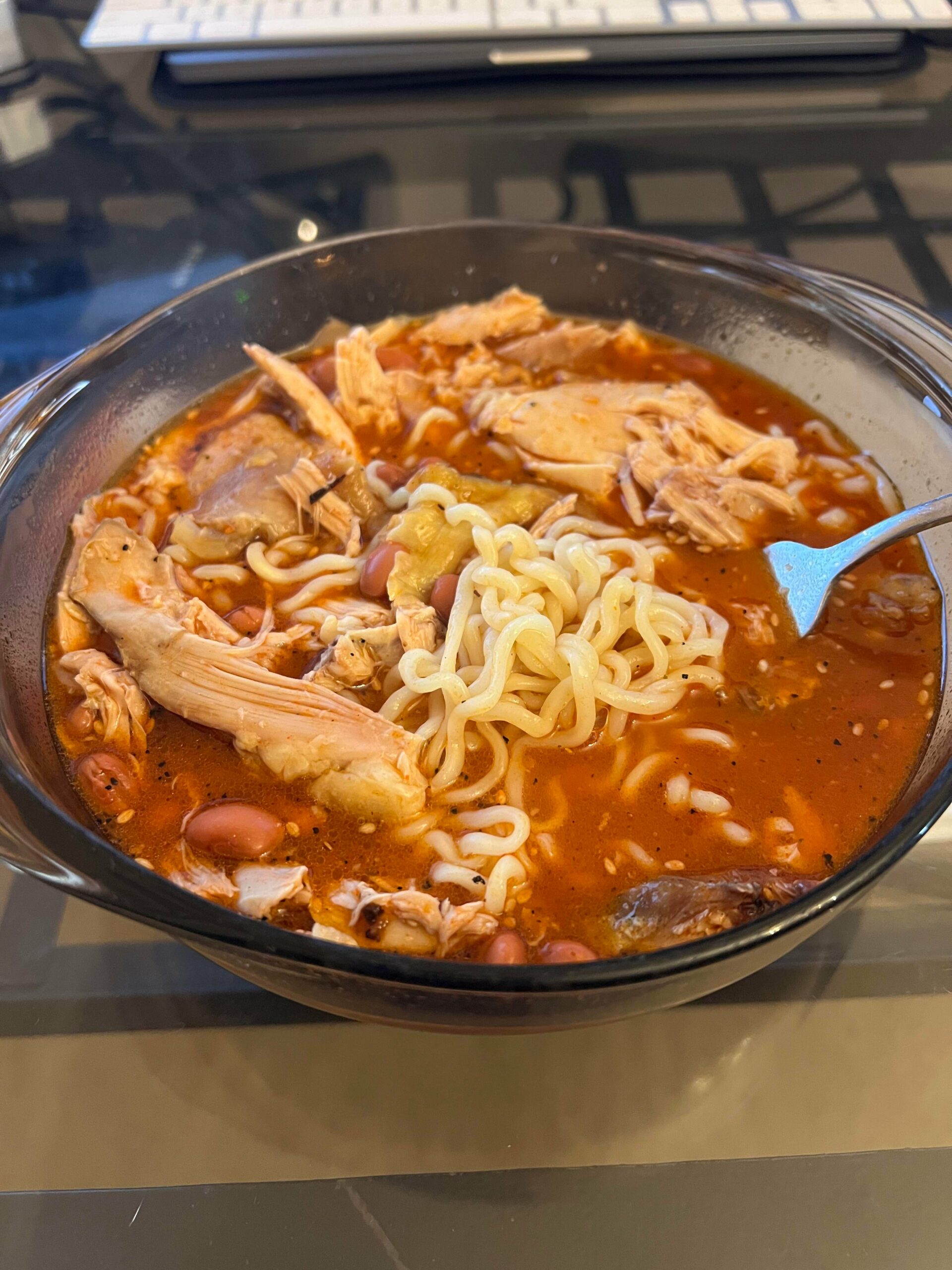 How I enjoy the Buldak 2X. Add a leg quarter, add some pinto beans, and ...